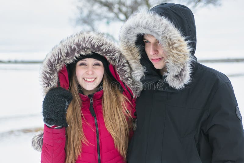 Two Teenagers Havinf Fun on the Snow Field Stock Photo - Image of ...