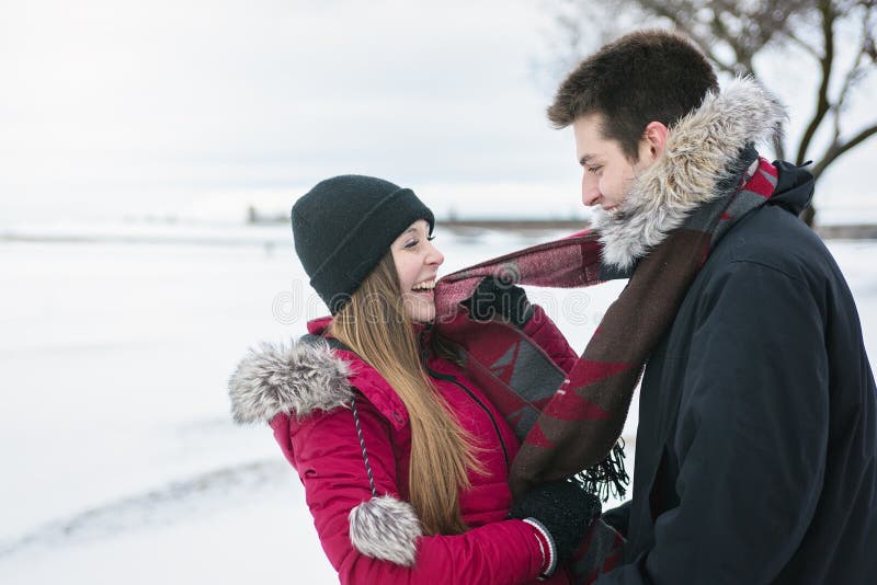 Two Teenagers Havinf Fun on the Snow Field Stock Photo - Image of girl ...