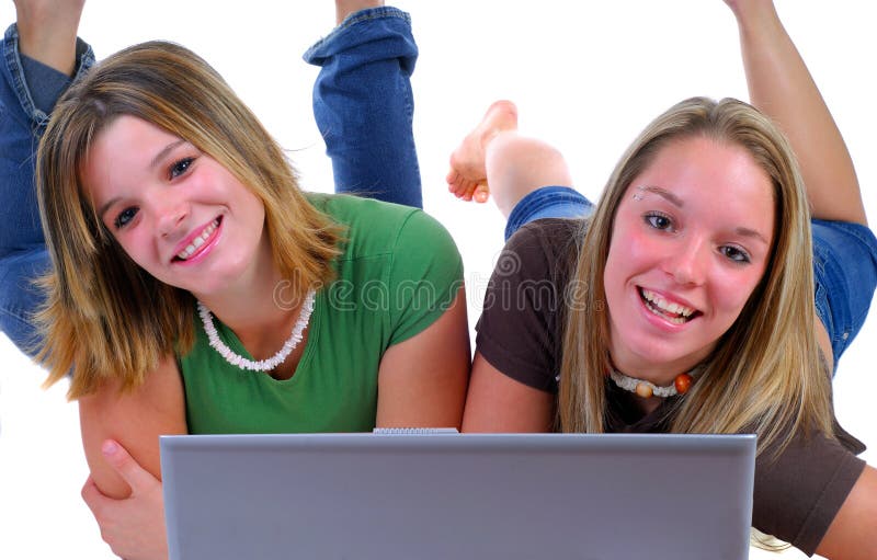 Two Teens with a Laptop stock image. Image of attractive - 2835417