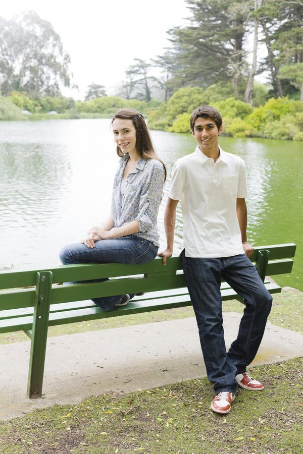 Two Teens in Park stock photo. Image of leaning, nature - 15270718
