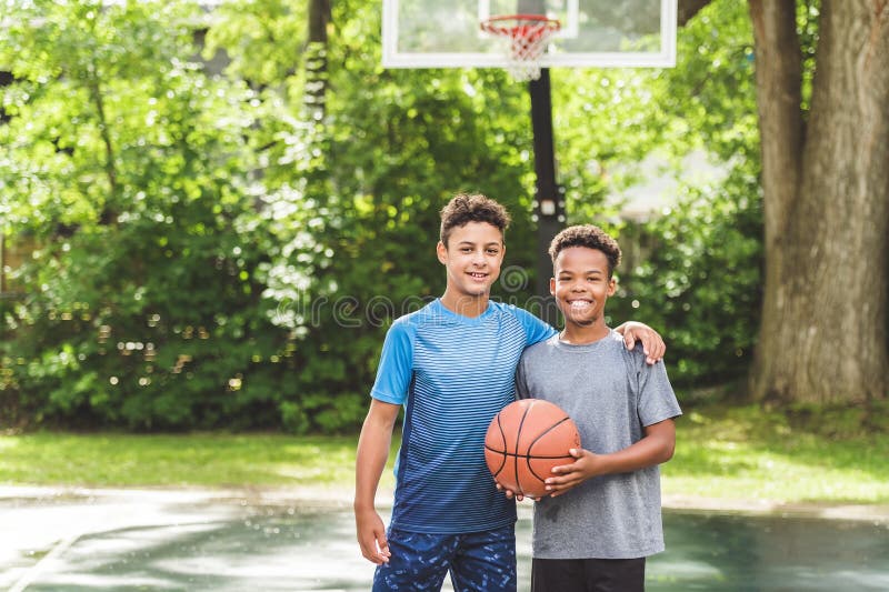 Two Teens in Sportswear Playing Basketball Game Stock Photo - Image of ...