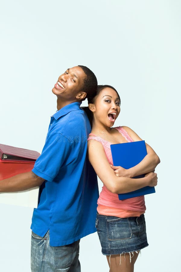 Two Teens Stand Back To Back - Vertical Stock Image - Image of black ...