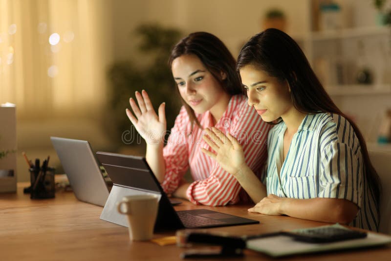 Two Tele Workers in the Night Having Video Call Stock Image - Image of ...