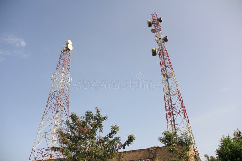 Two Telecommunications Towers with Plain Sky. Stock Photo - Image of ...