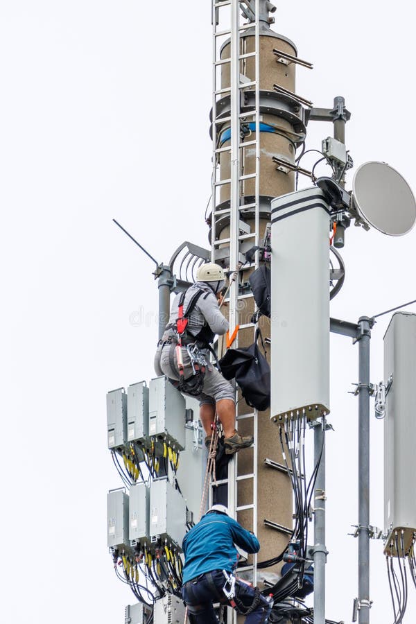 Telekom Technicians Perform Work on a Transmission Tower Editorial ...