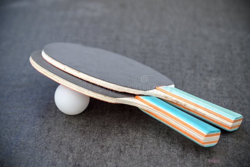 Two Tennis Rackets and One Ball on Table Outdoors. Active Leisure ...