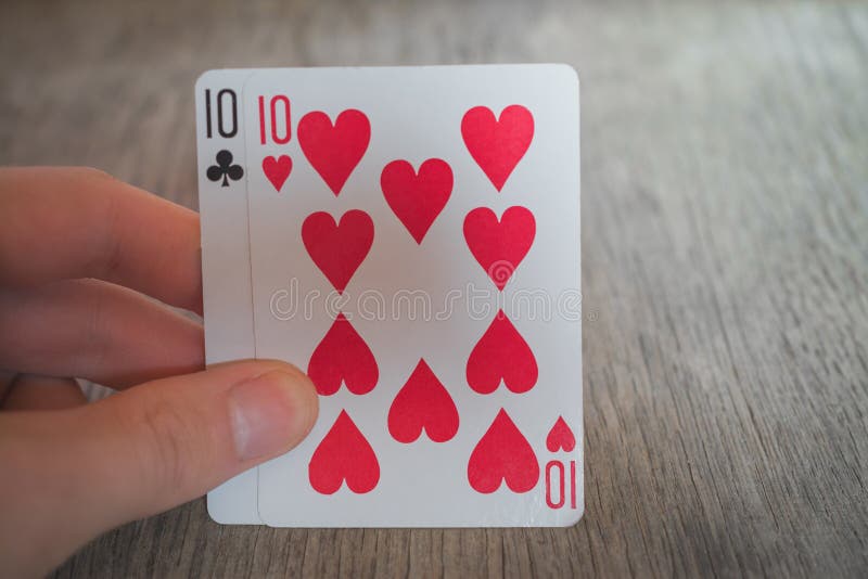 Two Tens, Playing Cards in Hand on the Table, Poker Nands Stock Image ...