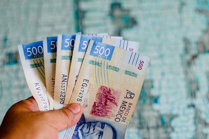 Two Thousand Five Hundred Mexican Pesos on a Wooden Table, Banknotes ...