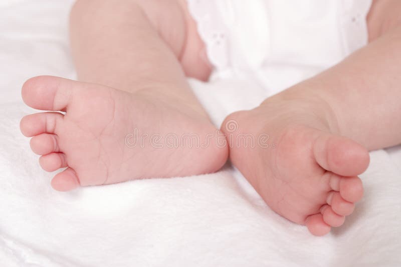 Two Tiny Baby Feet stock image. Image of skin, newborn - 2961811