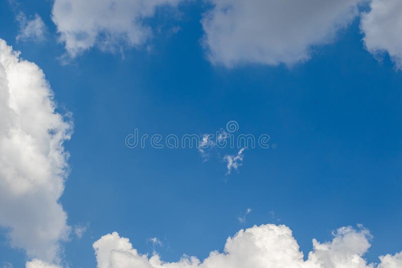 Two Tiny Clouds Cornered by Banks of Clouds on Three Sides Stock Image ...