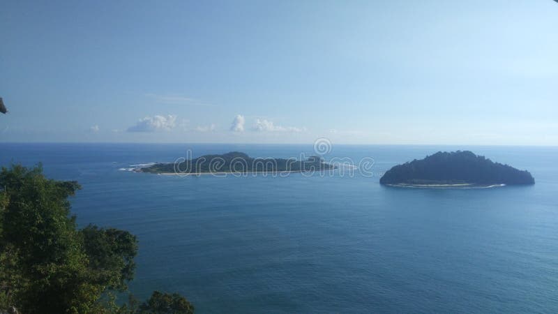 Two tiny islands stock photo. Image of coast, view, lake - 263782758