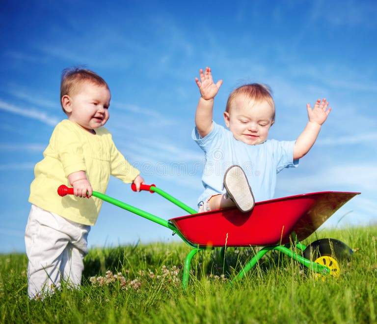Two Toddlers Playing Together Outdoors Stock Photo - Image of happiness ...