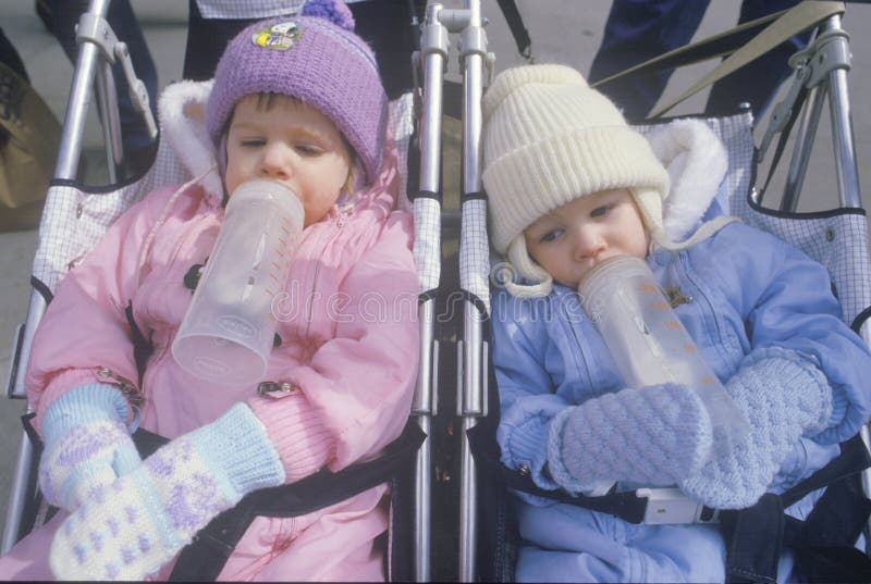 Two Toddlers Warmly Dressed in Their Strollers, NY Editorial ...