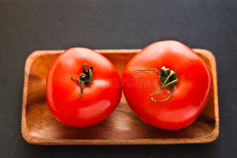 Two tomatoes stock image. Image of bowl, gourmet, cook - 11725405
