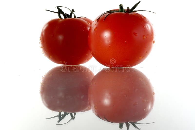 Two tomatoes stock image. Image of brightly, peel, ripe - 7420335