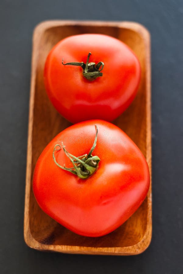 Two tomatoes stock image. Image of bowl, gourmet, cook - 11725405