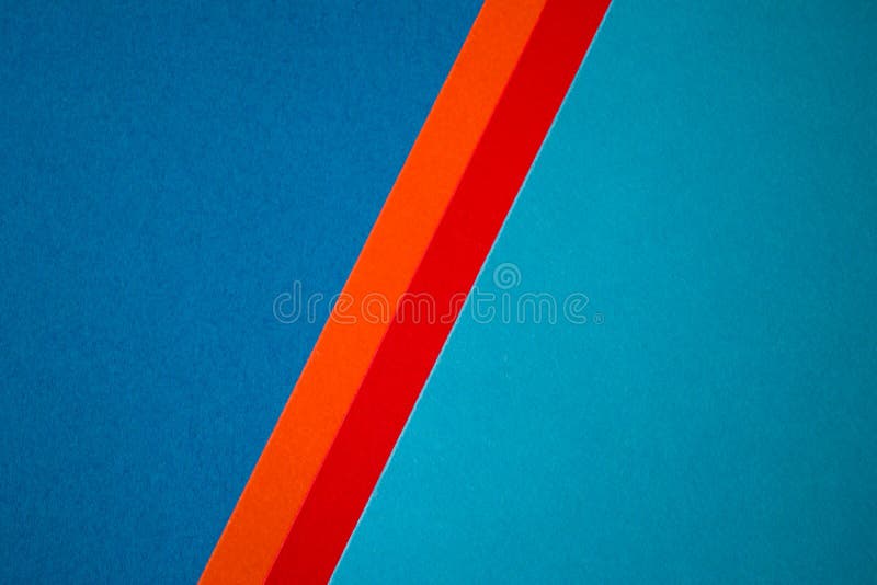 Two Tone Blue Colored Paper Divided with Red and Orange Stripes ...
