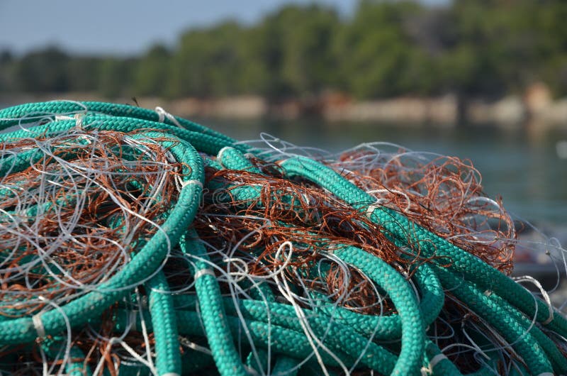 Two Tone Fishing Net in a Pile Stock Image - Image of leaf, fence ...