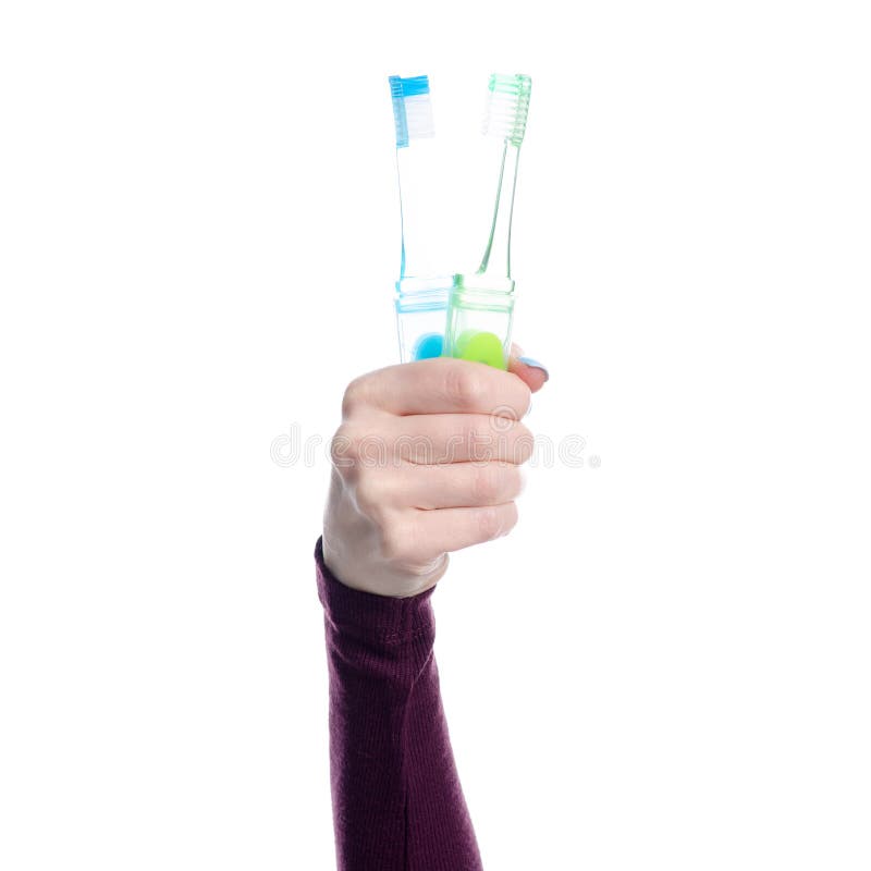 Two toothbrushes in hand stock image. Image of closeup - 144044225