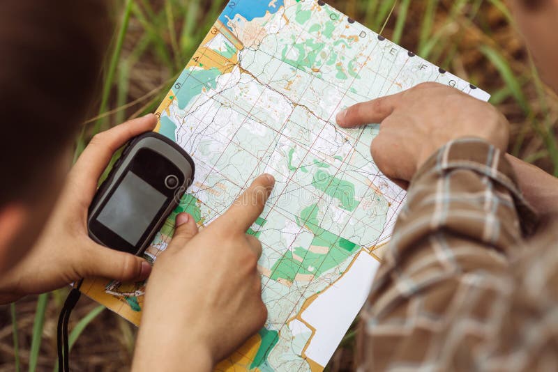 Two Tourist Determine the Route Map and Navigator Stock Photo - Image ...