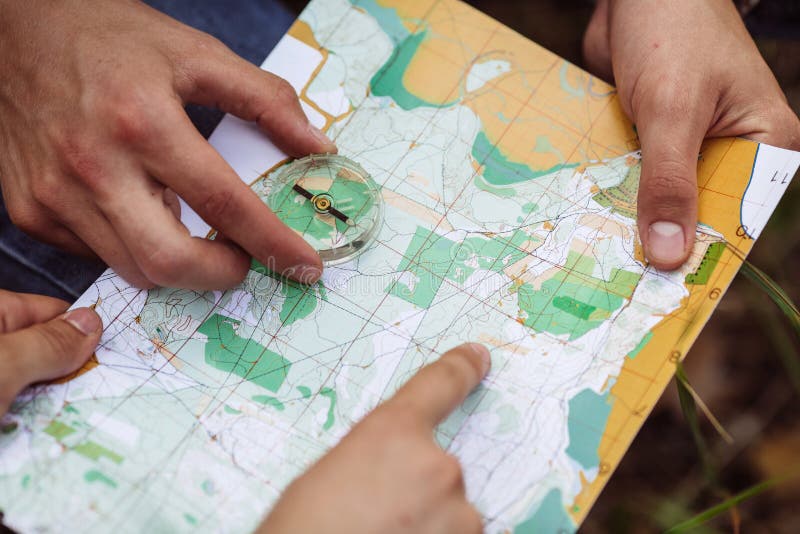 Two Tourist Determine the Route Map and Navigator Stock Photo - Image ...