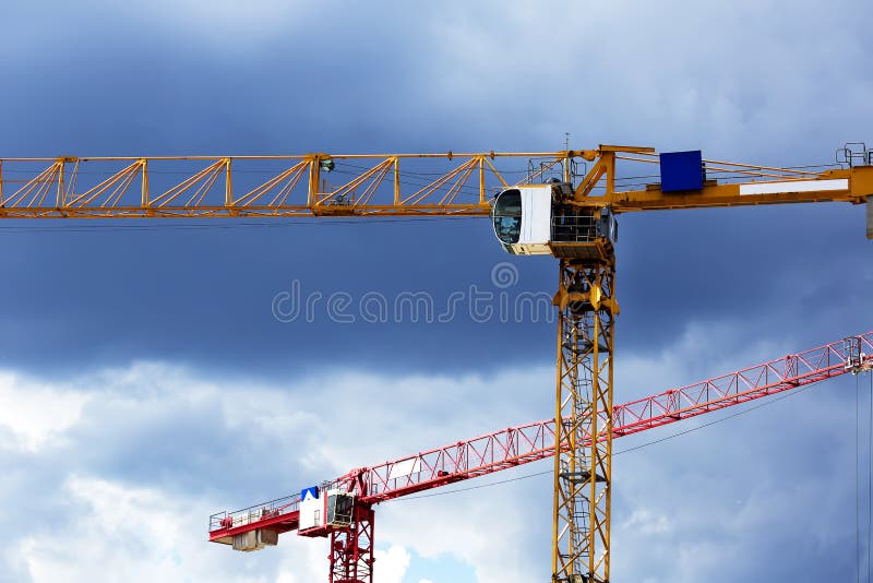 Two Tower Crane on a Background of Blue Sky Stock Photo - Image of ...