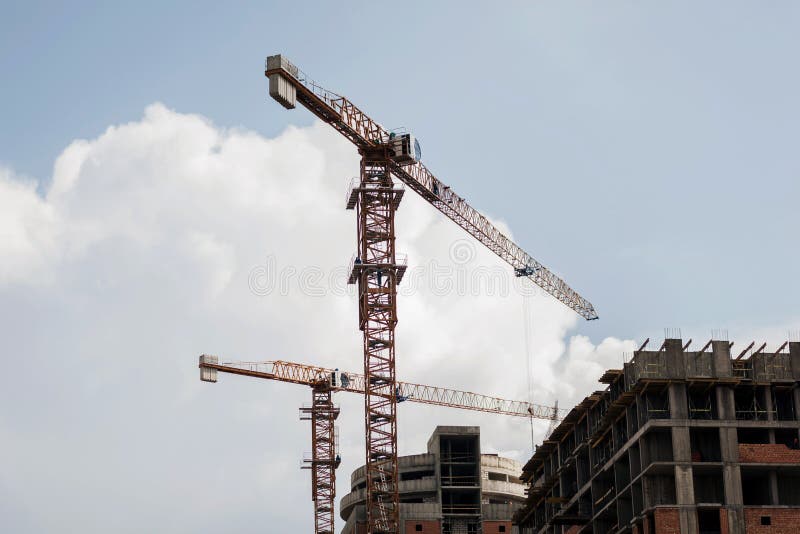 Two tower cranes stock photo. Image of equipment, construction - 249901178