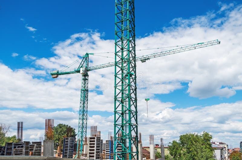 Two tower cranes stock photo. Image of infrastructure - 192467216