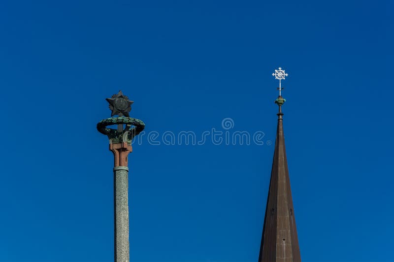 Two Towers, Cross & Soviet Star on a Background of Blue Sky Stock Photo ...