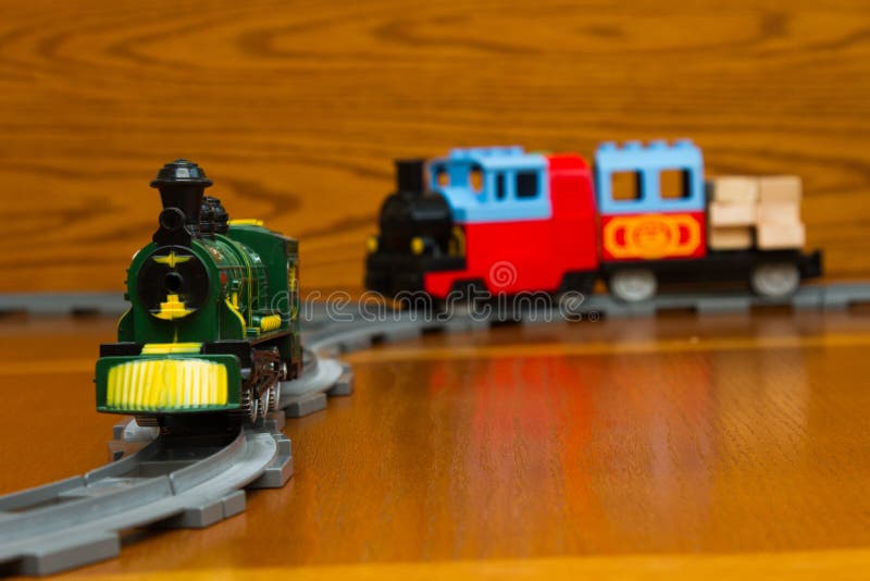 Two Toy Trains on the Gray Rails Stock Image - Image of public, freight ...
