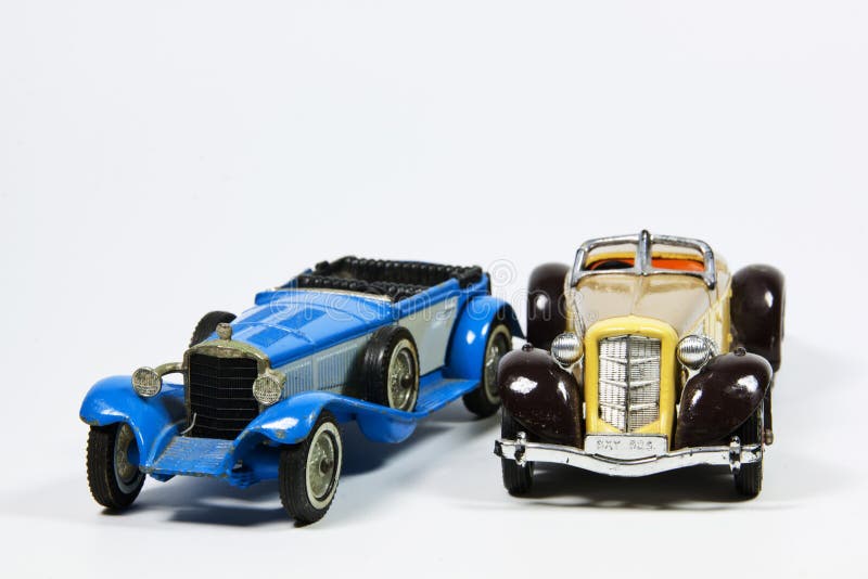 Two Toy Vintage Model Cars on White Stock Image - Image of automobile ...
