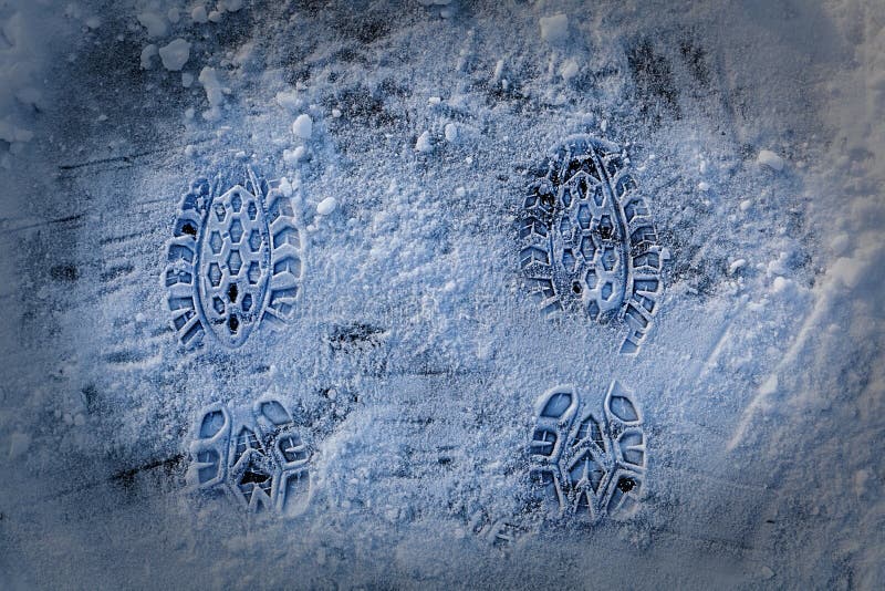 Tracks of Boots on Snow Close Up Vertical Photo Stock Image - Image of ...