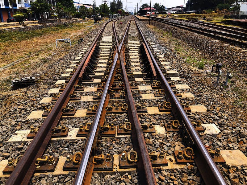 Two train tracks intersect stock image. Image of steel - 215617455