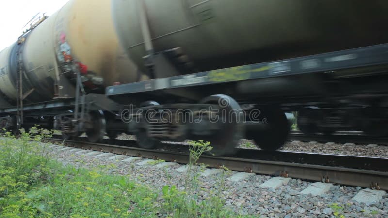 Trains Pass on a Rural Railway Track Surrounded by Rocky Terrain on a ...