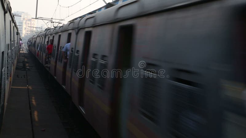 Two Trains Passing Each Other at the Train Station in Mumbai. Stock ...