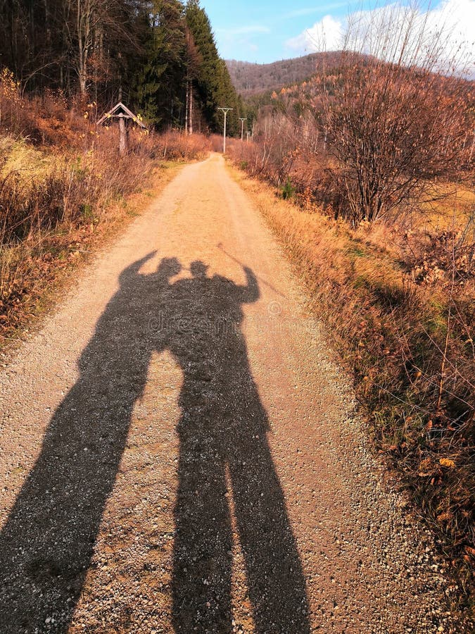 Two tramps on a long road stock image. Image of track - 189719689