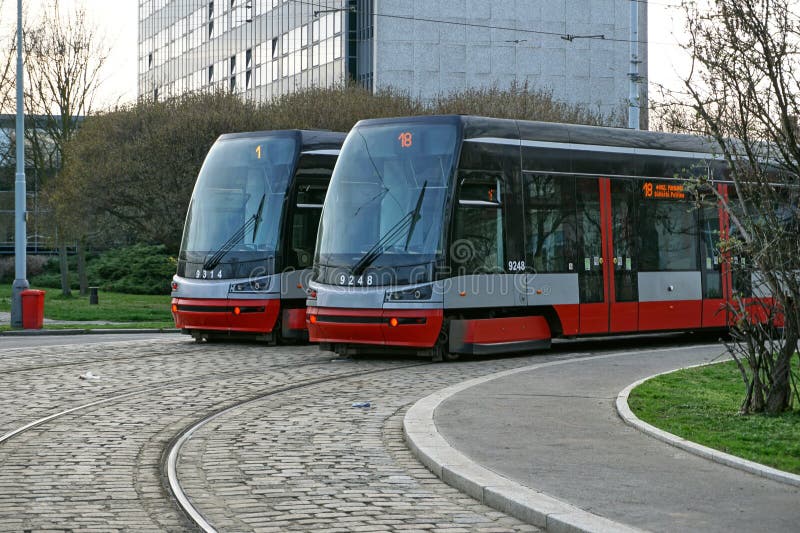 Two Trams on the Parallel Cobbled Tracks in Prague, Czech Republic ...