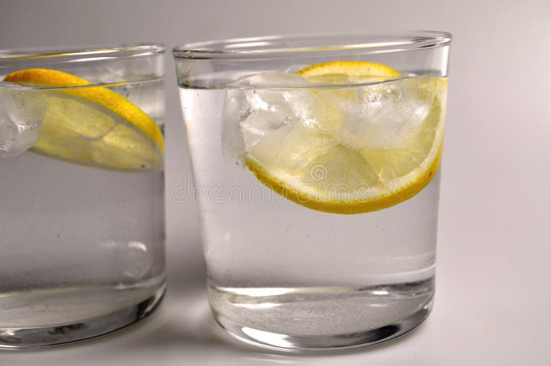 Two Transparent Glasses with Colorless Liquid - Water, Alcohol Stock ...