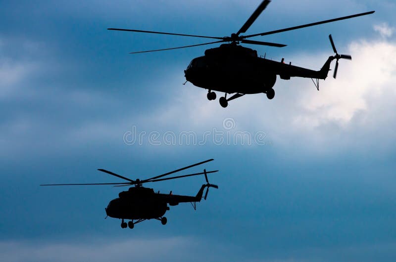 Two transport helicopters stock image. Image of blade - 76529331