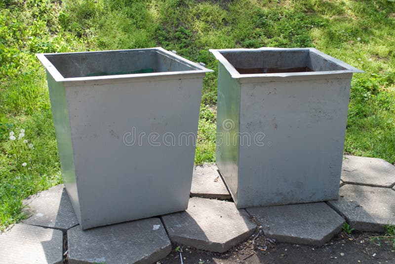 Two trash cans stock image. Image of outdoors, trashcan - 16986259