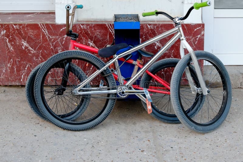 Two Trendy Bmx Bikes Near Wall Stock Image - Image of town, cycle: 57858051