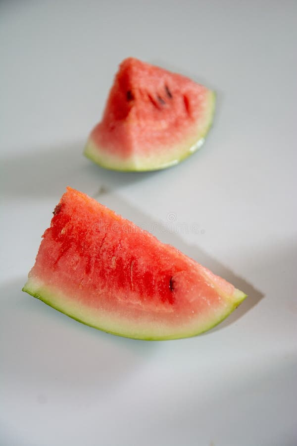 Two Slices of Fresh and Tender Watermelon, with Red and Juicy Flesh ...