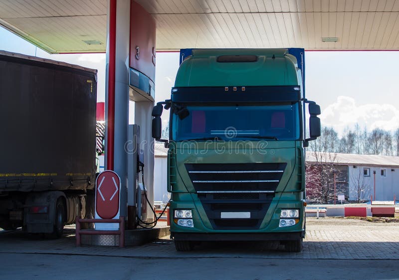 Two Trucks at a Gas Station Stock Photo - Image of industry, refueling ...