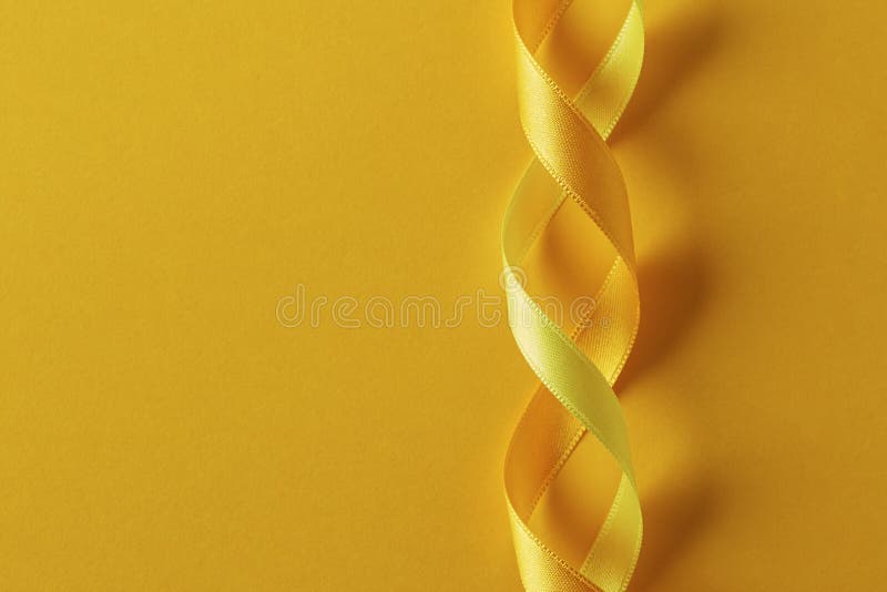 Two twisted yellow ribbons stock photo. Image of wallpaper - 34412478