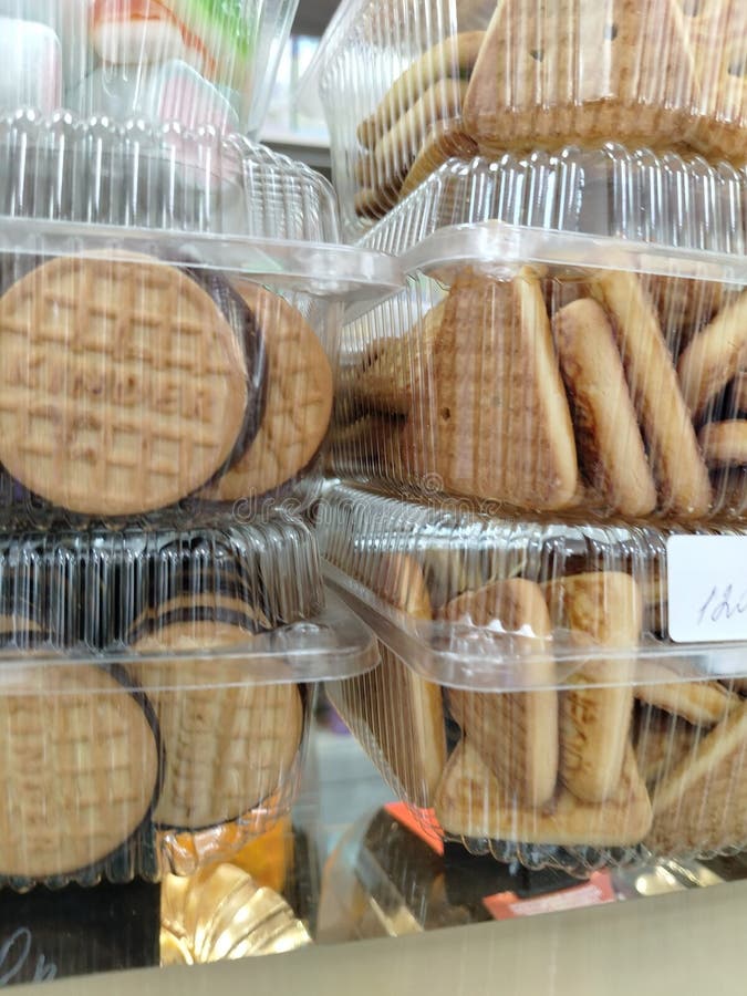 Two Types of Cookies in Transparent Plastic Boxes Stand on Top of Each ...