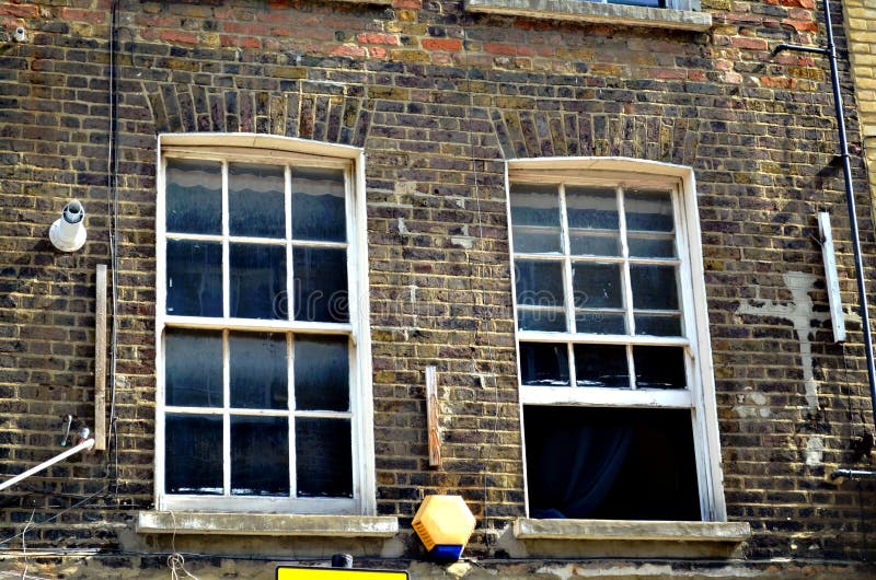Two Typical British Window in a Brick Wall Stock Photo - Image of arch ...