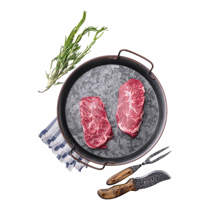 Two Uncooked Beef Steaks Rest on a Metal Tray, Accompanied by a Fresh ...