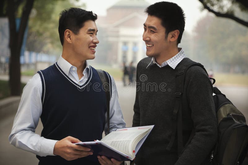 Two University Students on Campus Stock Photo - Image of incidental ...