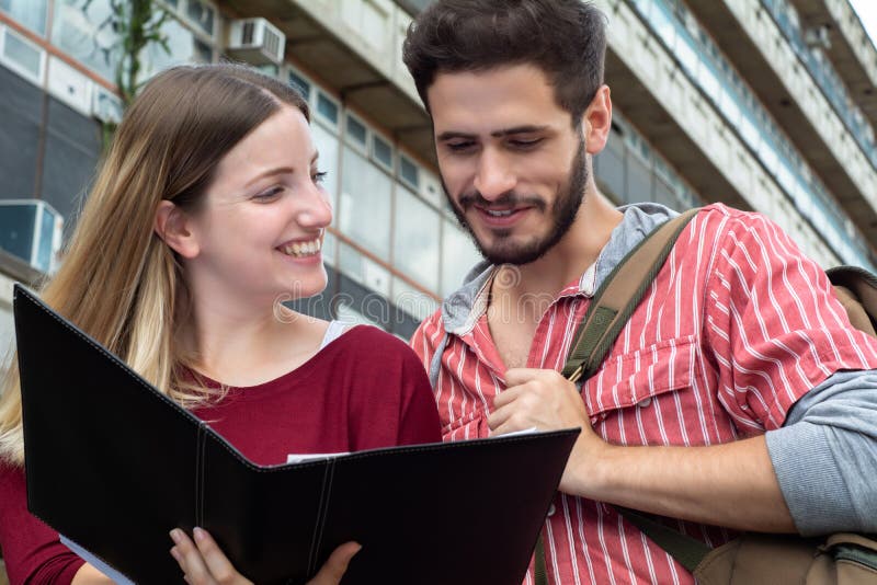 Two University Students Studying Together Outdoors Stock Photo - Image ...
