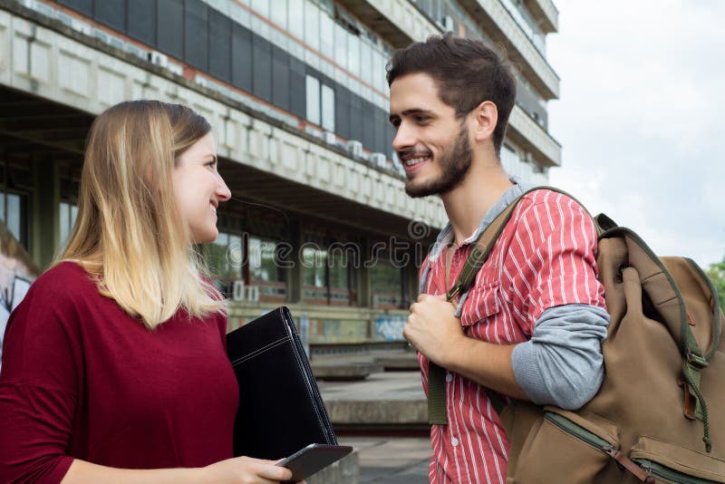 Two University Students Studying Together Outdoors Stock Image - Image ...